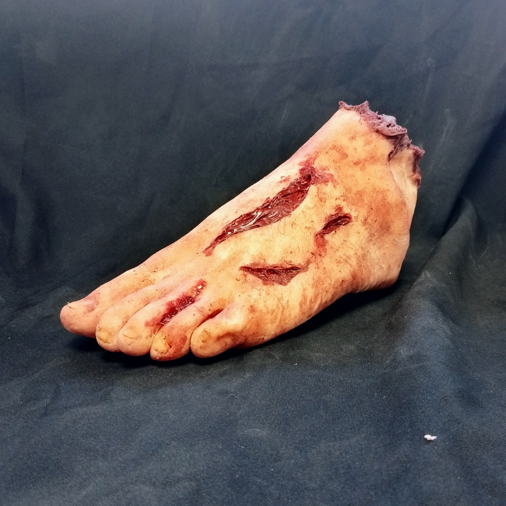 Silicone Male Severed Foot - Scarred | Mad About Horror